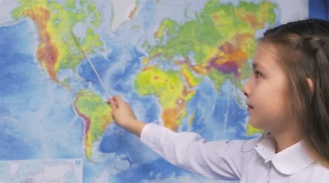 Girl with World Map in Classroom | Stock Video | Pond5