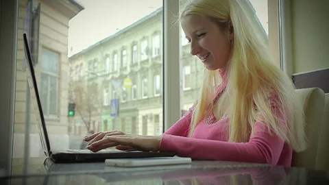 Girl Writes a Letter on the Laptop in a ... | Stock Video | Pond5