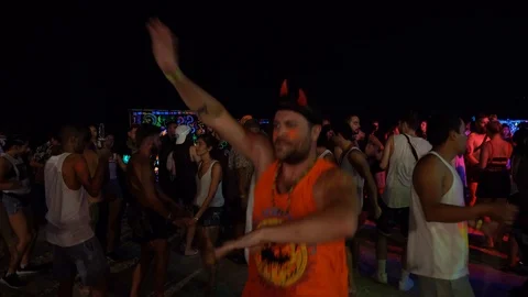 Girls and boys dance on the sandy beach ... | Stock Video | Pond5