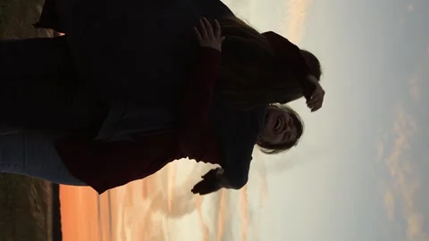 Girls friends hugging at sunset in park,... | Stock Video | Pond5