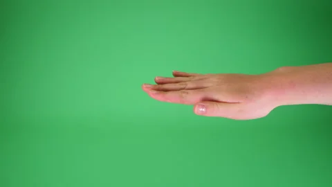 Girls hand paper on Green screen Chromak... | Stock Video | Pond5