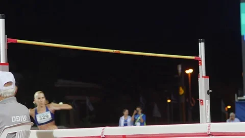 Girls jumping pole vault Maccabiah Games... | Stock Video | Pond5