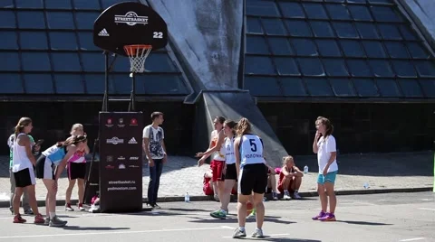 Girls playing outdoor street basketball ... | Stock Video | Pond5