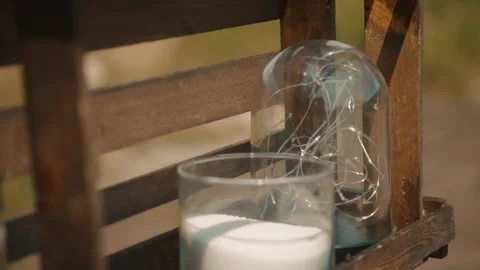 Glass beaker with white powder and round... | Stock Video | Pond5