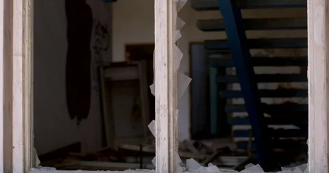 The glass broken window. Fragments stick... | Stock Video | Pond5
