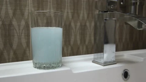 A glass of cleaning liquid from an effer... | Stock Video | Pond5