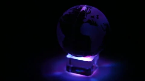 Glass Earth sphere rotates on cube with ... | Stock Video | Pond5