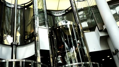 Glass elevator at the mall going up in l... | Stock Video | Pond5