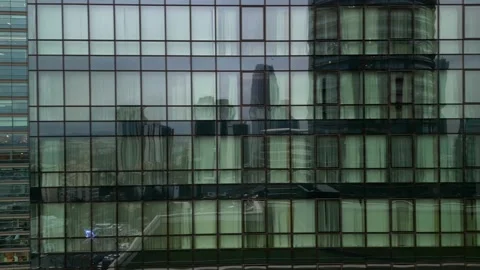 Glass facade of the skyscraper drone fly... | Stock Video | Pond5
