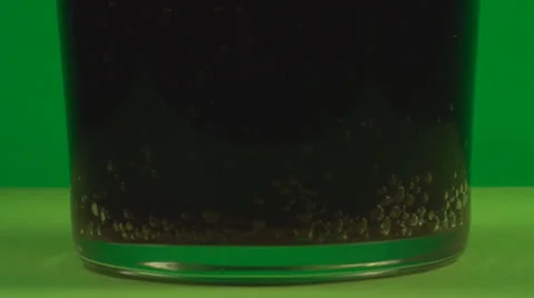Glass Full With Soda On A Green Screen, ... | Stock Video | Pond5