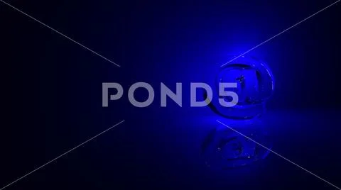 The glass symbol @ is under a beam of light, located on a blue ...