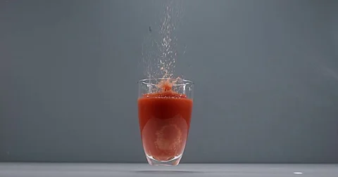 Glass of Tomatoe's Juice falling, Slow M... | Stock Video | Pond5