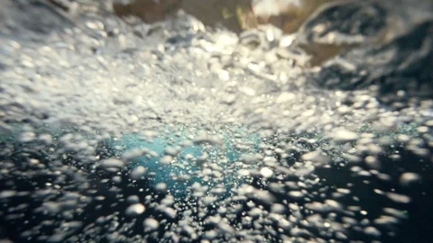 Glimmering water bubbles underwater view... | Stock Video | Pond5