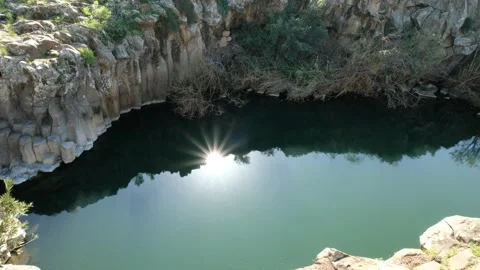 A glittering basalt pool. 4K | Stock Video | Pond5