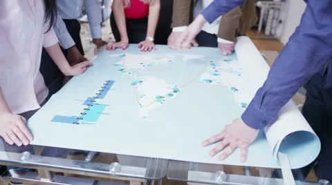 Global business team examining a map of ... | Stock Video | Pond5