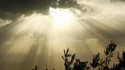 Glorious sky with rays of light through ... | Stock Video | Pond5