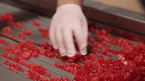 Gloved hand doing quality control check ... | Stock Video | Pond5