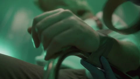 Gloved Hands of Serial Killer Tying Host... | Stock Video | Pond5