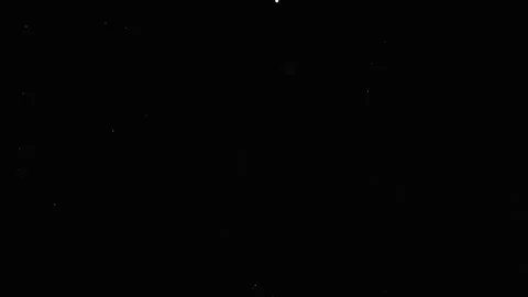 Glowing dust particles floating in alpha... | Stock Video | Pond5