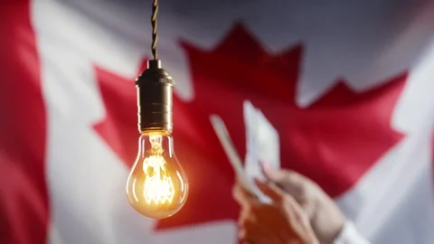 Glowing Edison light bulb on canadian fl... | Stock Video | Pond5