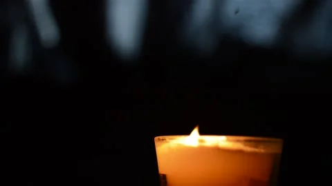 glowing horror red flame of a candle in ... | Stock Video | Pond5