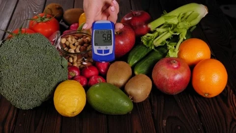 Glucose meter with fresh raw vegetables ... | Stock Video | Pond5