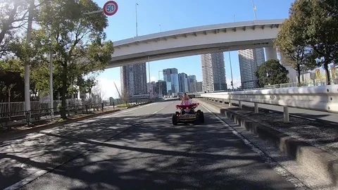 Go Cart Driving Over A Bridge On A Sunny... | Stock Video | Pond5