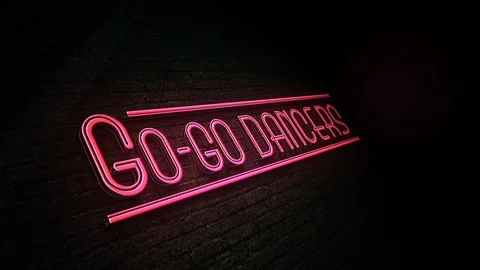 GO-GO DANCERS neon red sign on dark bric... | Stock Video | Pond5