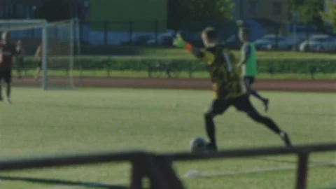 Goalkeeper throws in a soccer ball by le... | Stock Video | Pond5