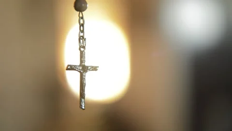 god cross crucifix on a light blur backg... | Stock Video | Pond5