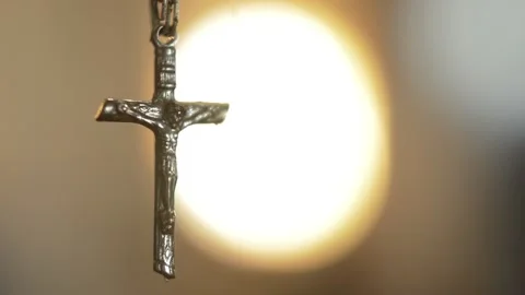 god cross crucifix on a light blur backg... | Stock Video | Pond5