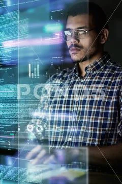 Going through the source code. Cropped shot of a young computer programmer lo Stock Photo #170588220