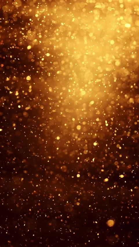 Gold floating dust particles on dark bac... | Stock Video | Pond5