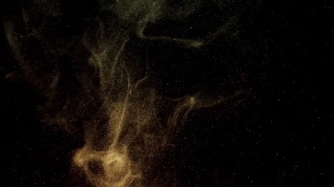 Gold glitter magic dust alpha particles... | Stock Video | Pond5