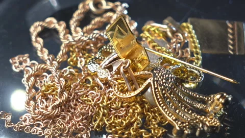 Gold jewelry on the scales at jeweler. A... | Stock Video | Pond5