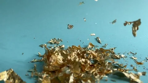 gold leaf falling and floating down to b... | Stock Video | Pond5