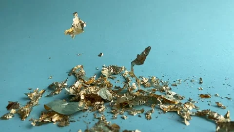 gold leaf - gold leaf falling and floati... | Stock Video | Pond5
