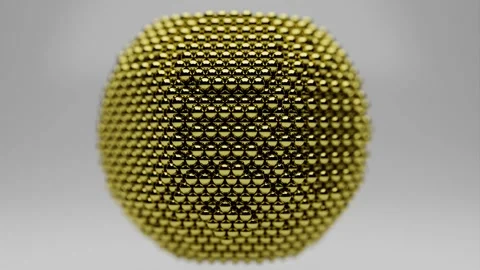 Gold nanoparticle spinning white backdro... | Stock Video | Pond5