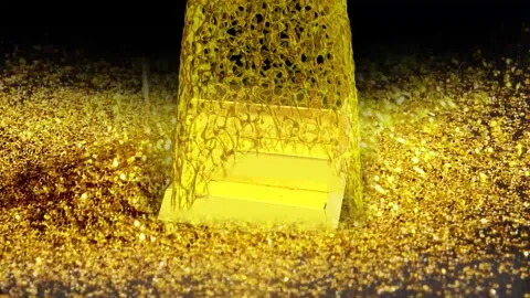 gold particles and gold bars | Stock Video | Pond5