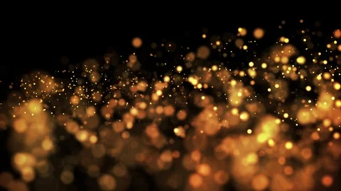gold particles in liquid float and glist... | Stock Video | Pond5