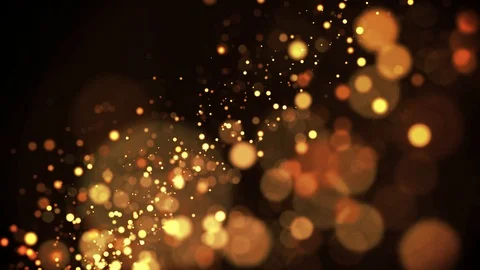 gold particles in liquid float and glist... | Stock Video | Pond5
