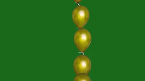 golden balloons rising one after another... | Stock Video | Pond5