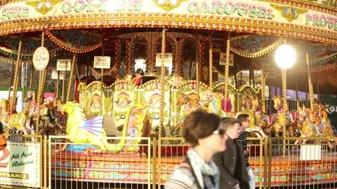 Golden gallopers fairground ride on the ... | Stock Video | Pond5