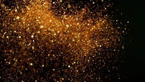 Golden glitter explosion in super slow m... | Stock Video | Pond5