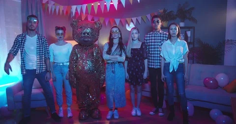 Golden life-size teddy bear doll dancing... | Stock Video | Pond5