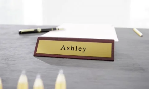 Golden Name Tag of Ashley on a CEO or po... | Stock Video | Pond5