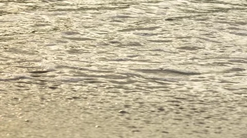 Golden sand with wave wash and soft foam... | Stock Video | Pond5