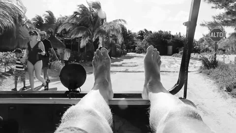 Golf cart buggy ride with feet up Holbox... | Stock Video | Pond5