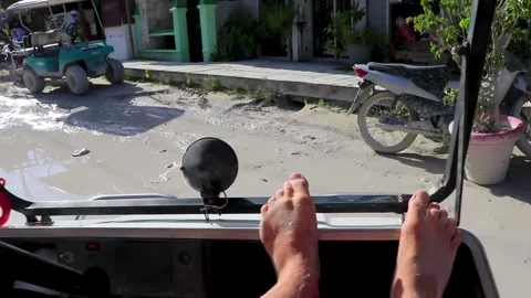 Golf cart buggy ride with feet up Holbox... | Stock Video | Pond5