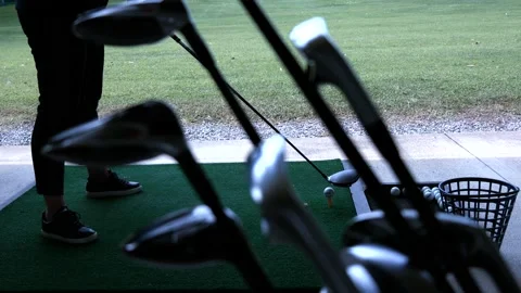 Golfer Practice Golf Swing with Her Driv... | Stock Video | Pond5